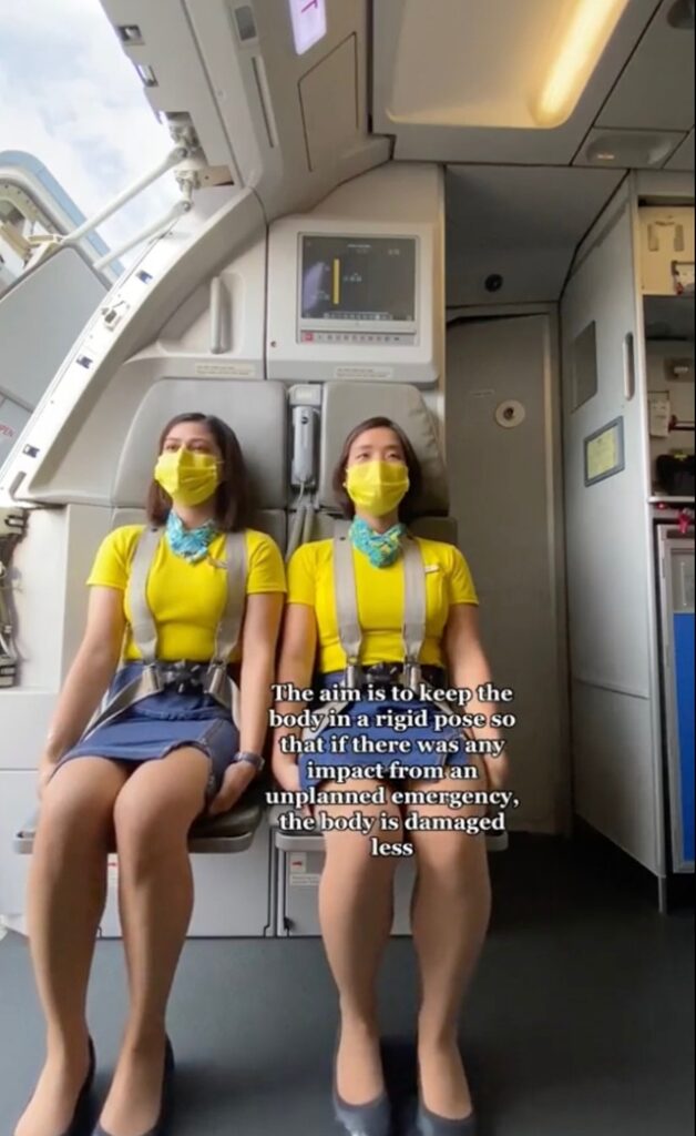 Why Do Cabin Crew Sit On Their Hands During Takeoff and Landing? A ...